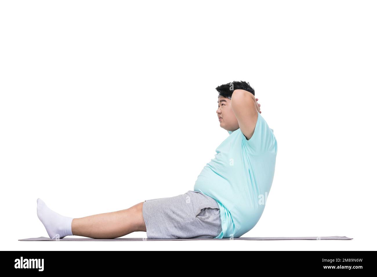 Fat young men in doing sports Stock Photo - Alamy