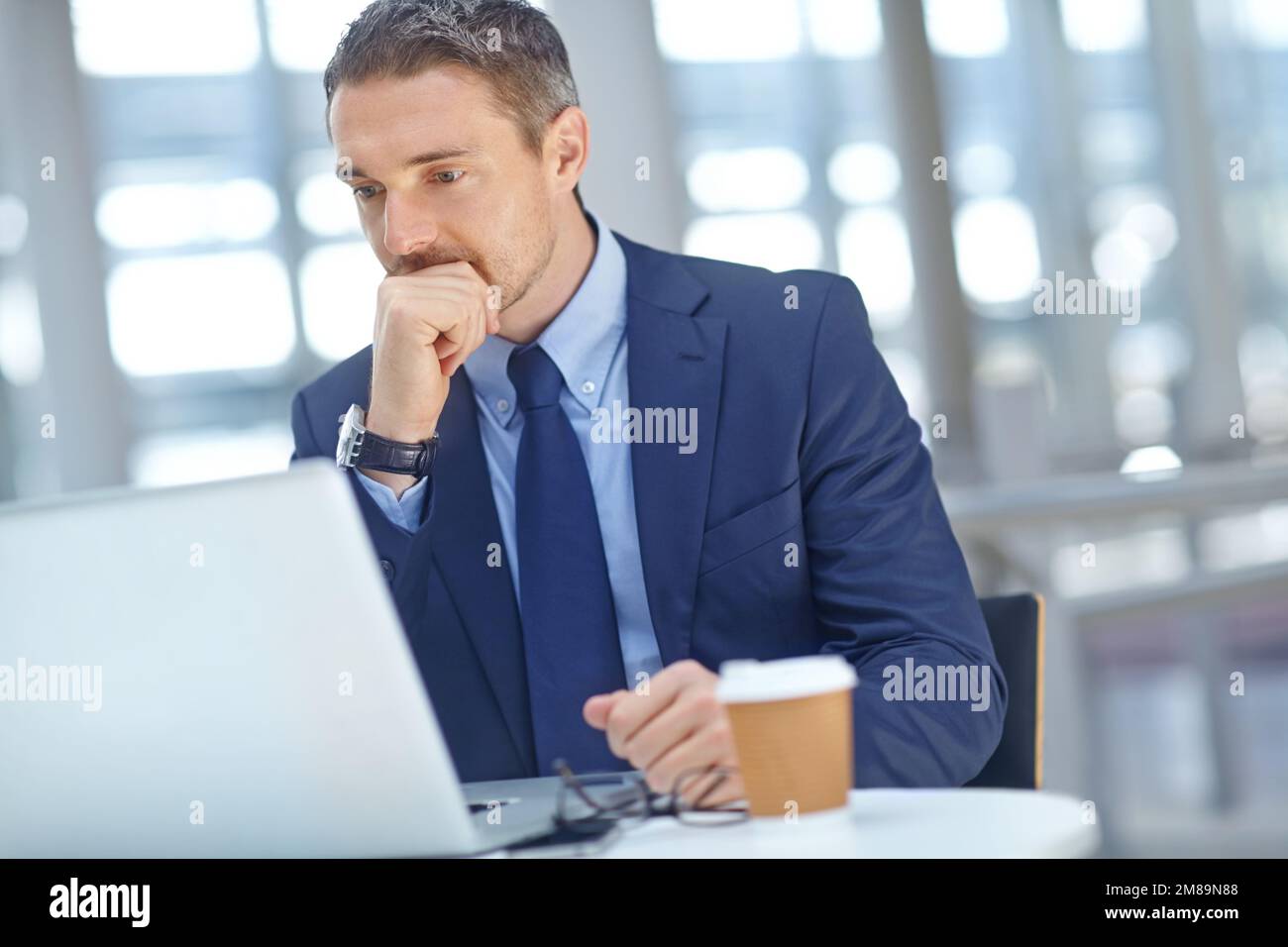 Laptop, finance and male accountant thinking while working on financial ...