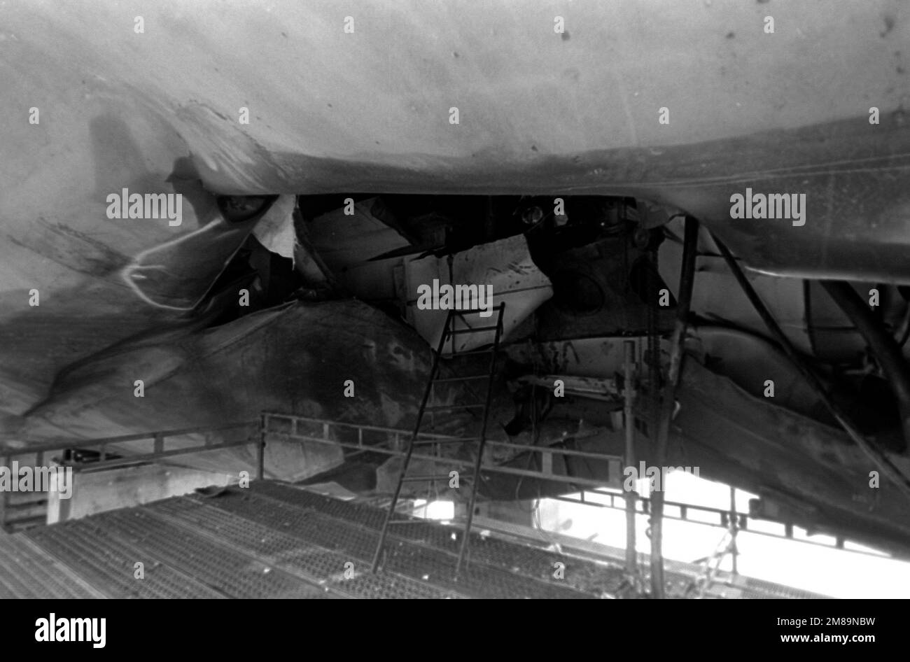 A view of damage to the hull of the guided missile frigate USS SAMUEL B ...
