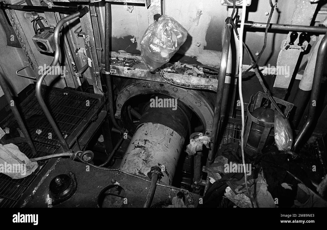 A view of damage in the main engine room of the guided missile frigate ...