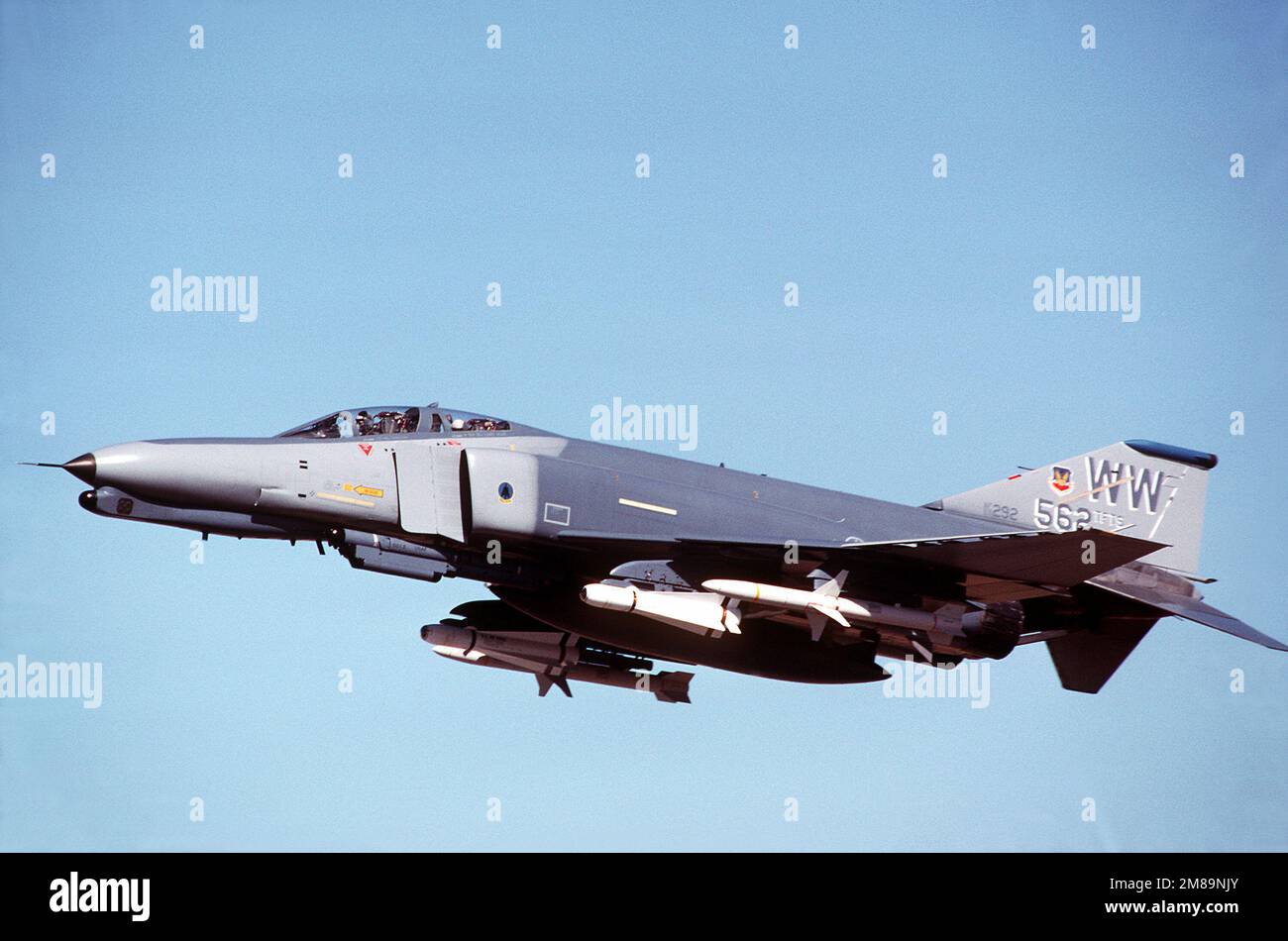 An air-to-air left side view of an F-4G Wild Weasel Phantom II aircraft ...