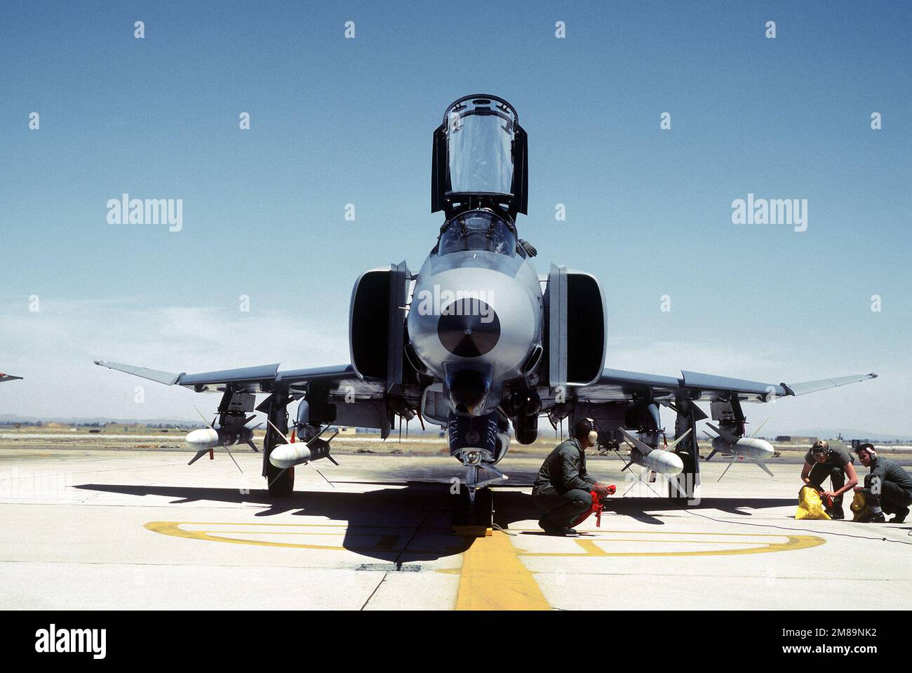 Armament personnel prepare an F-4G Wild Weasel Phantom II aircraft from ...