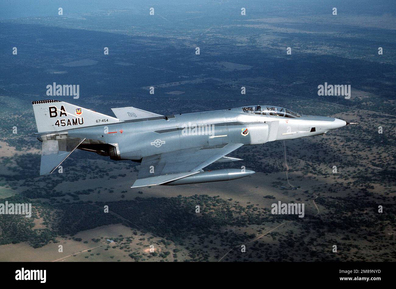 An air-to-air right side view of an RF-4C Phantom II aircraft of the ...