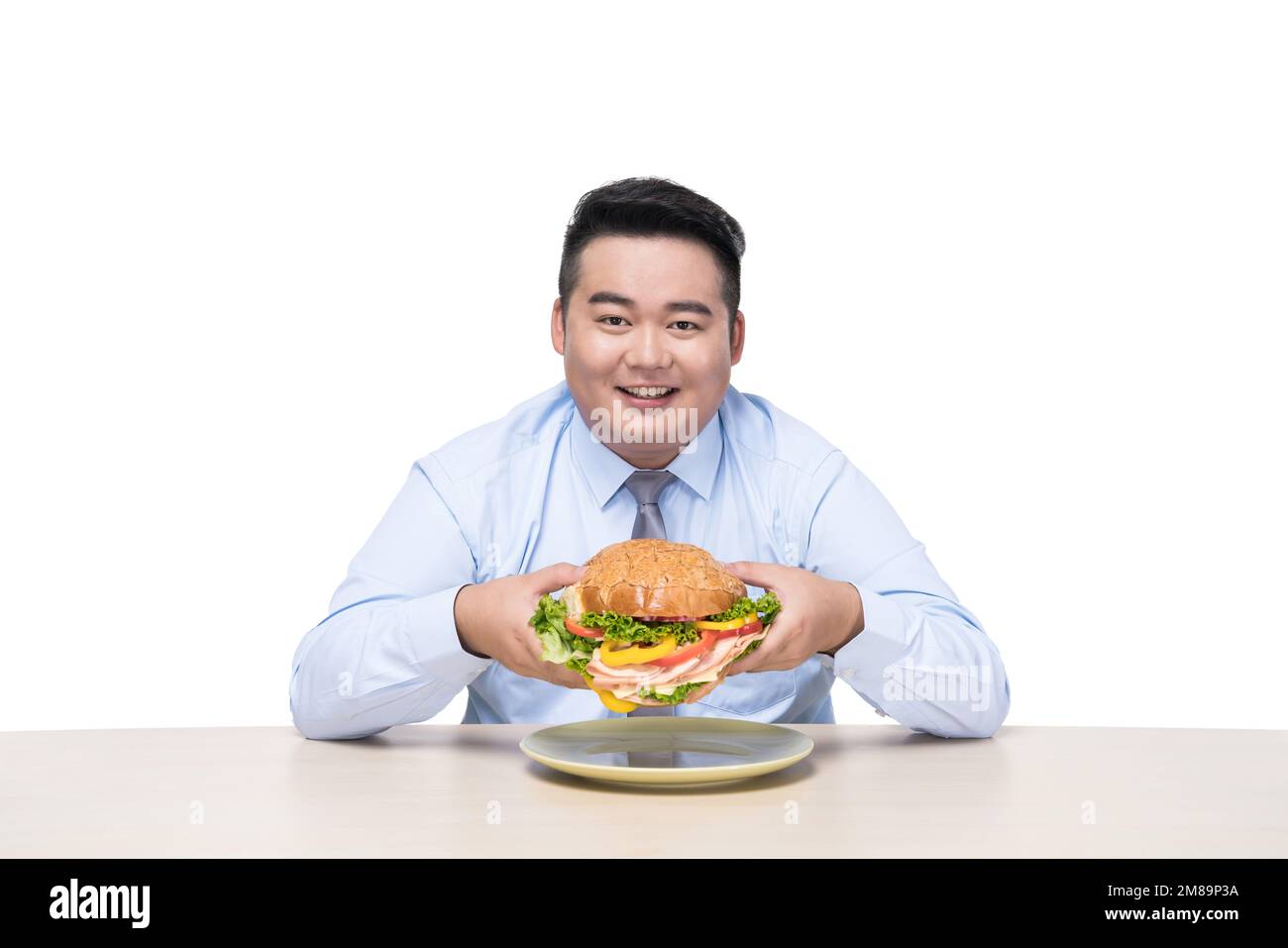 Fat people eat hamburgers Stock Photo - Alamy