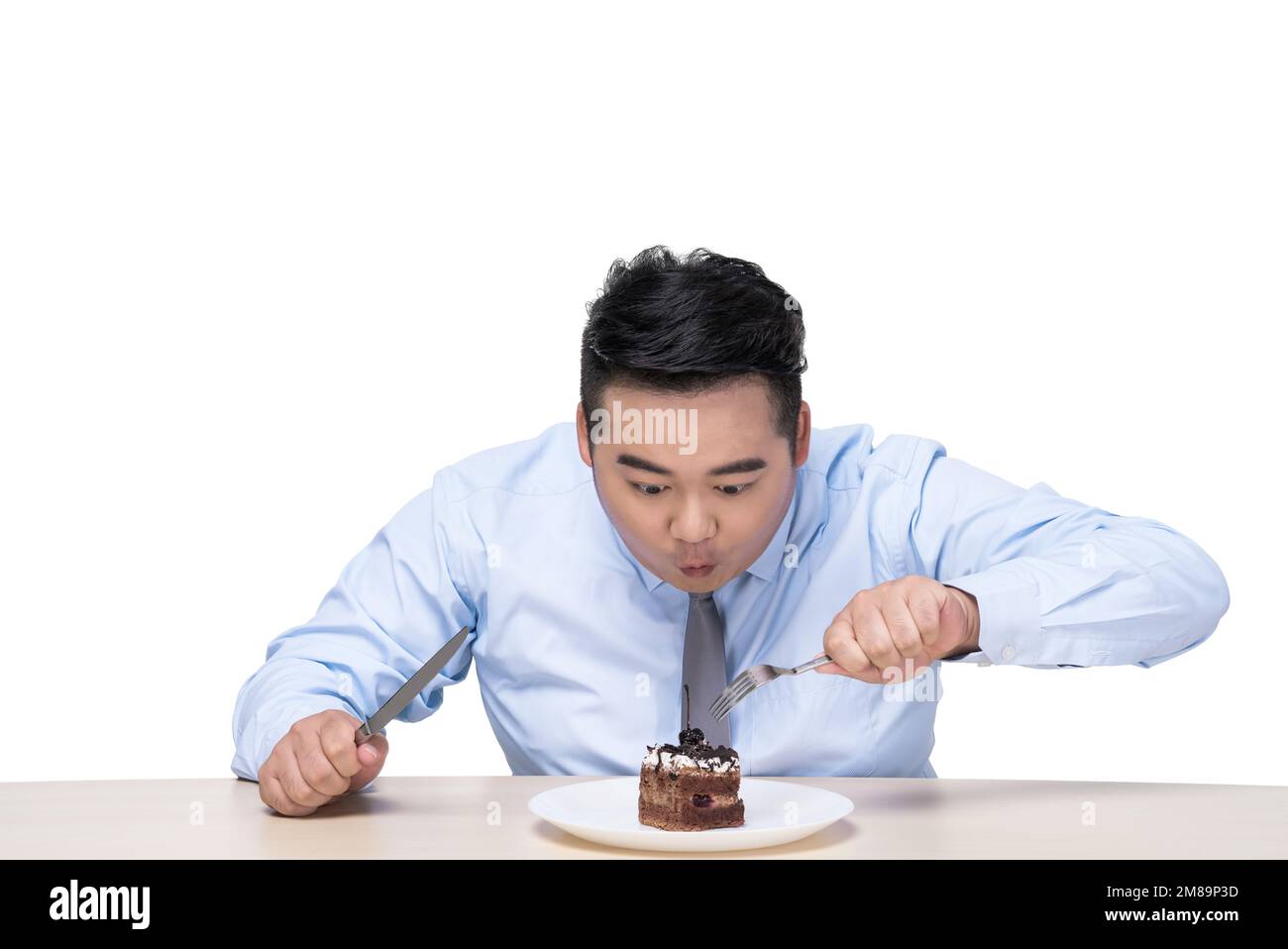 Fat people eat cake Stock Photo - Alamy