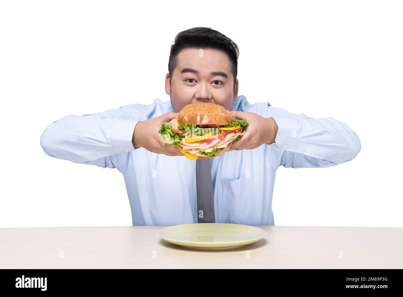 Fat people eat hamburgers Stock Photo - Alamy