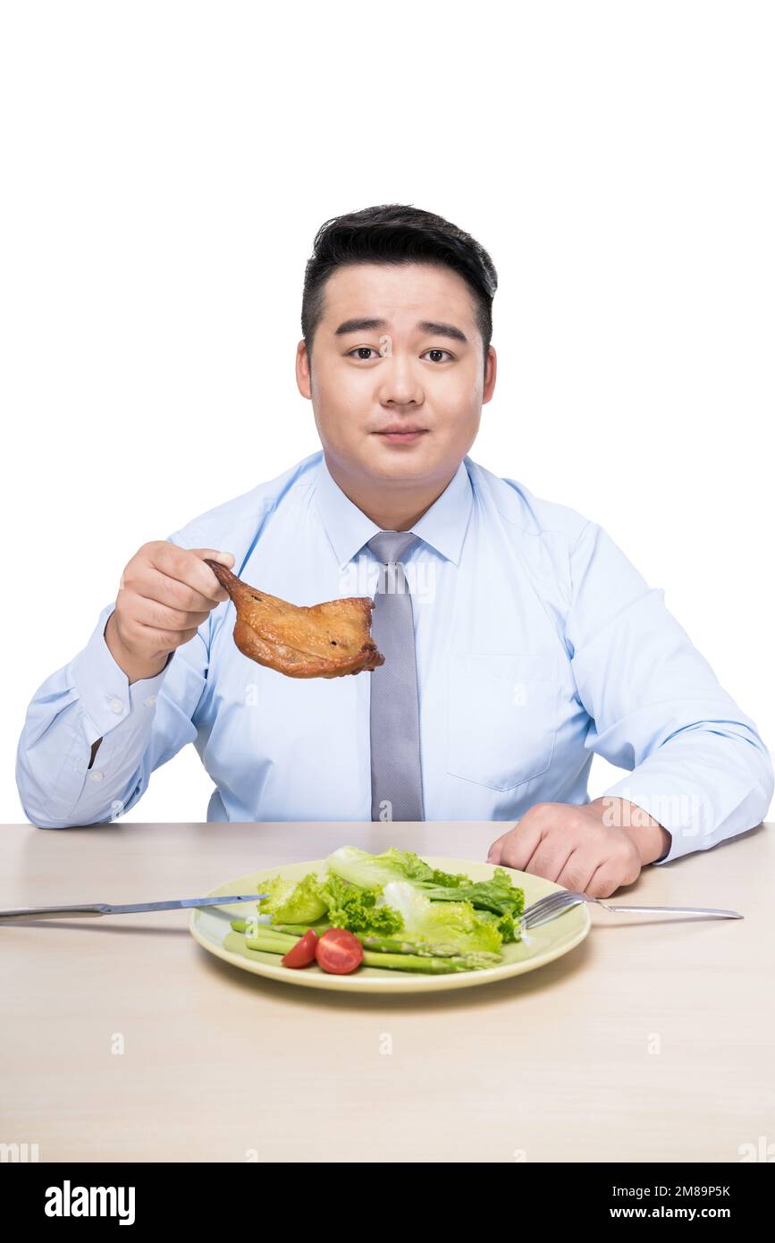 Fat people at dinner Stock Photo - Alamy