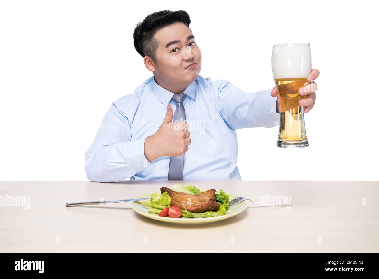 Fat man eating dinner suit hi-res stock photography and images - Alamy