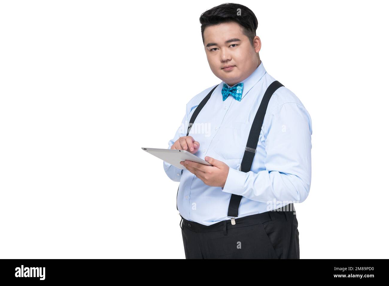 Take a tablet of obese young men Stock Photo - Alamy