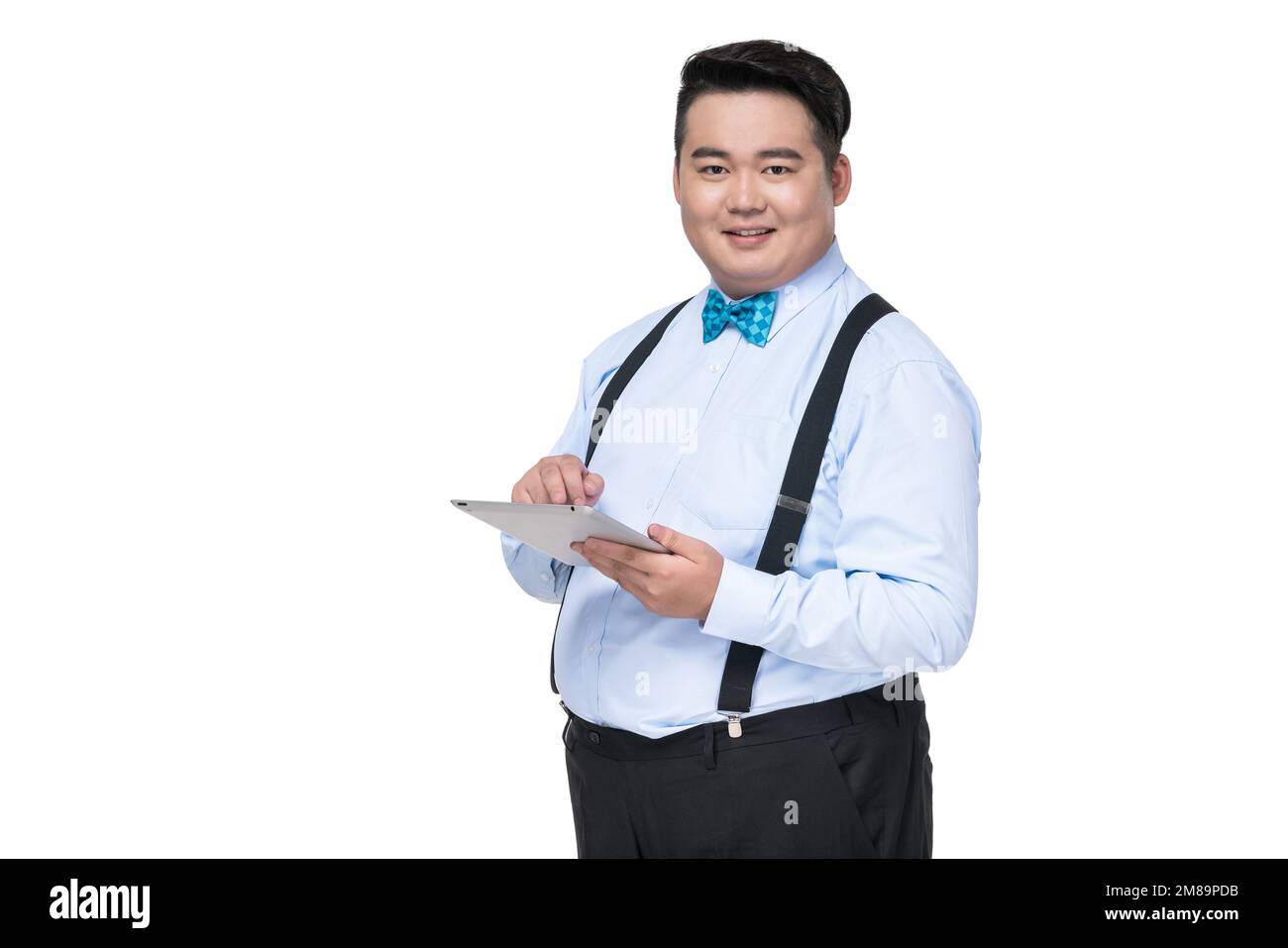 Take a tablet of obese young men Stock Photo - Alamy