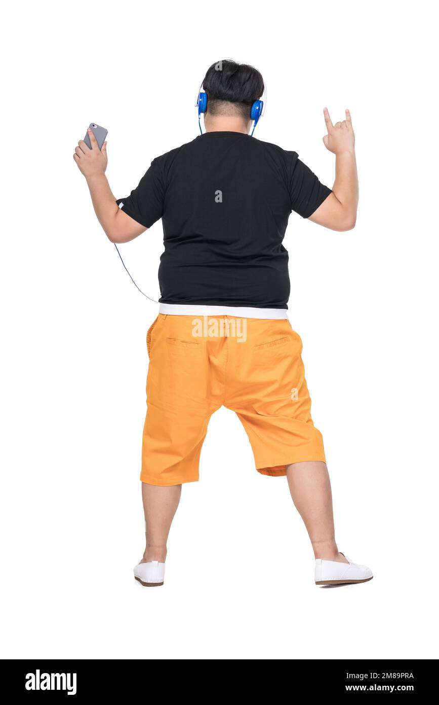 Fat young men listen to music Stock Photo - Alamy