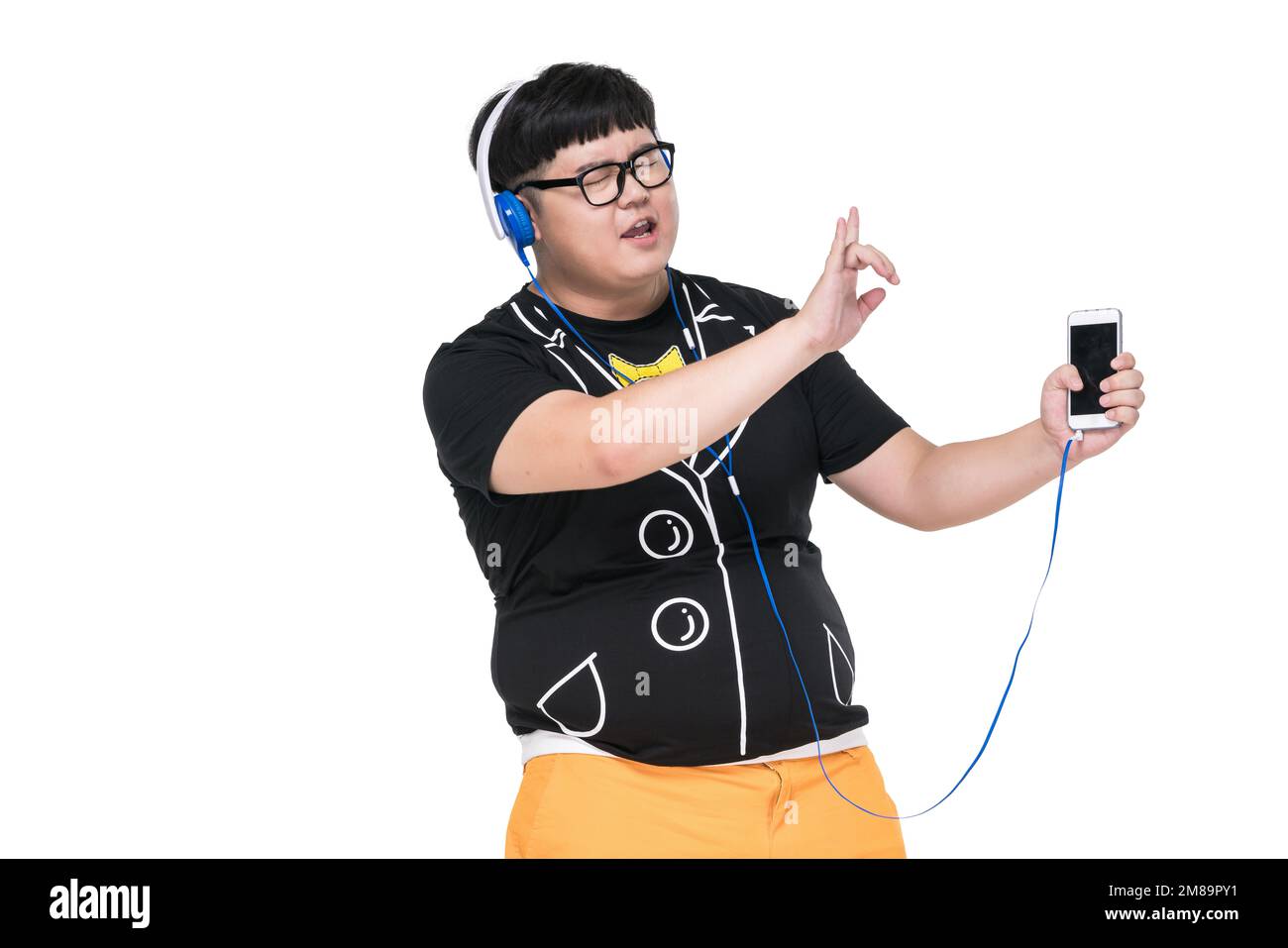 Fat young men listen to music Stock Photo - Alamy