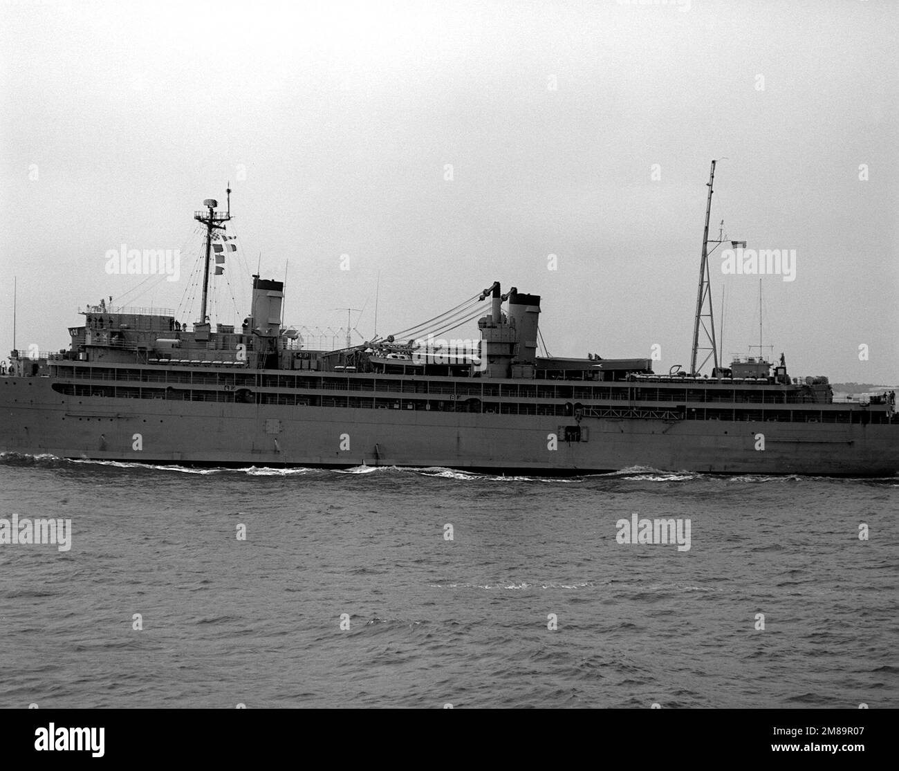 A port amidships view of the superstructure of the repair ship USS ...