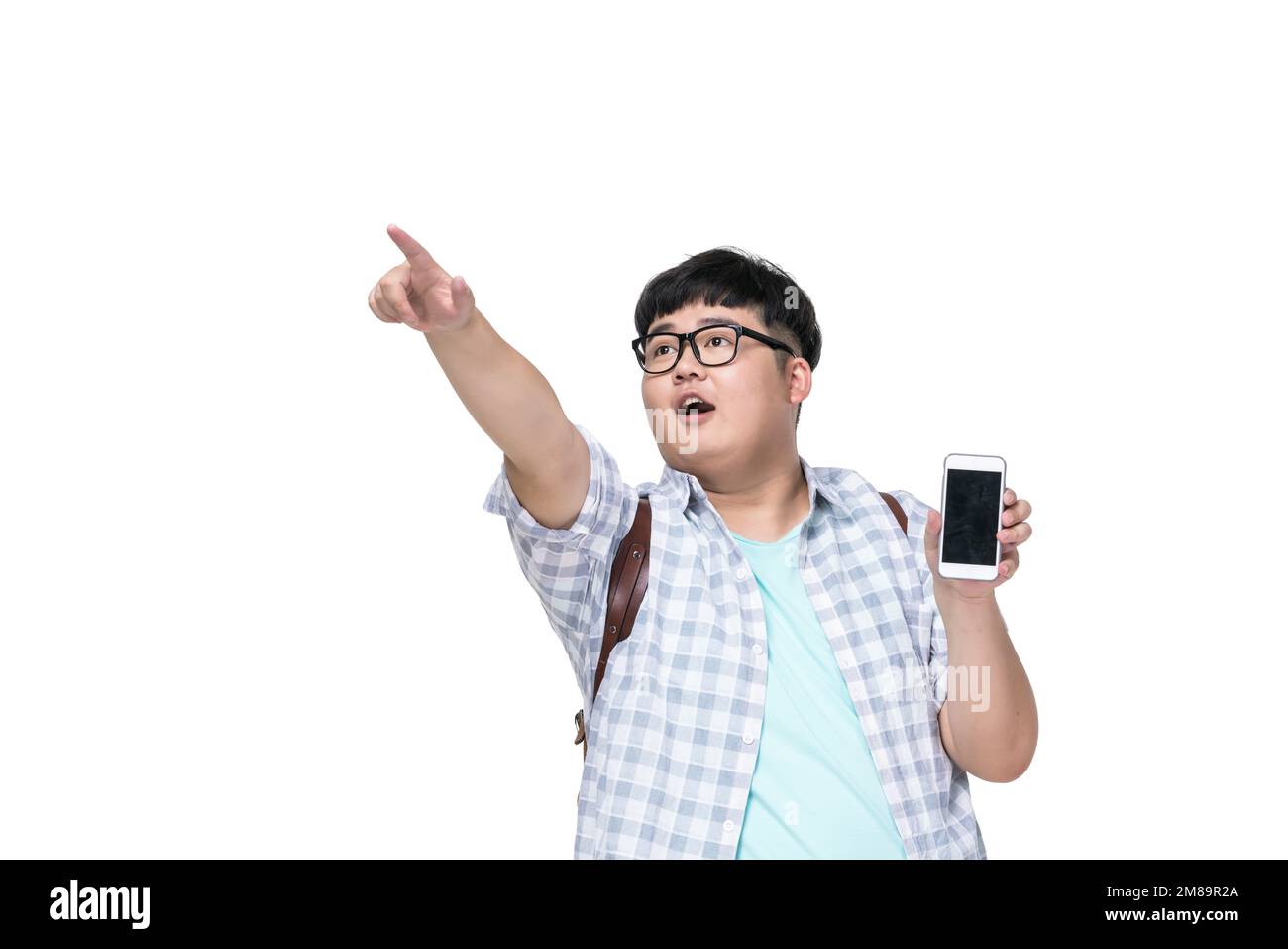 Obese young man holding a mobile phone Stock Photo - Alamy