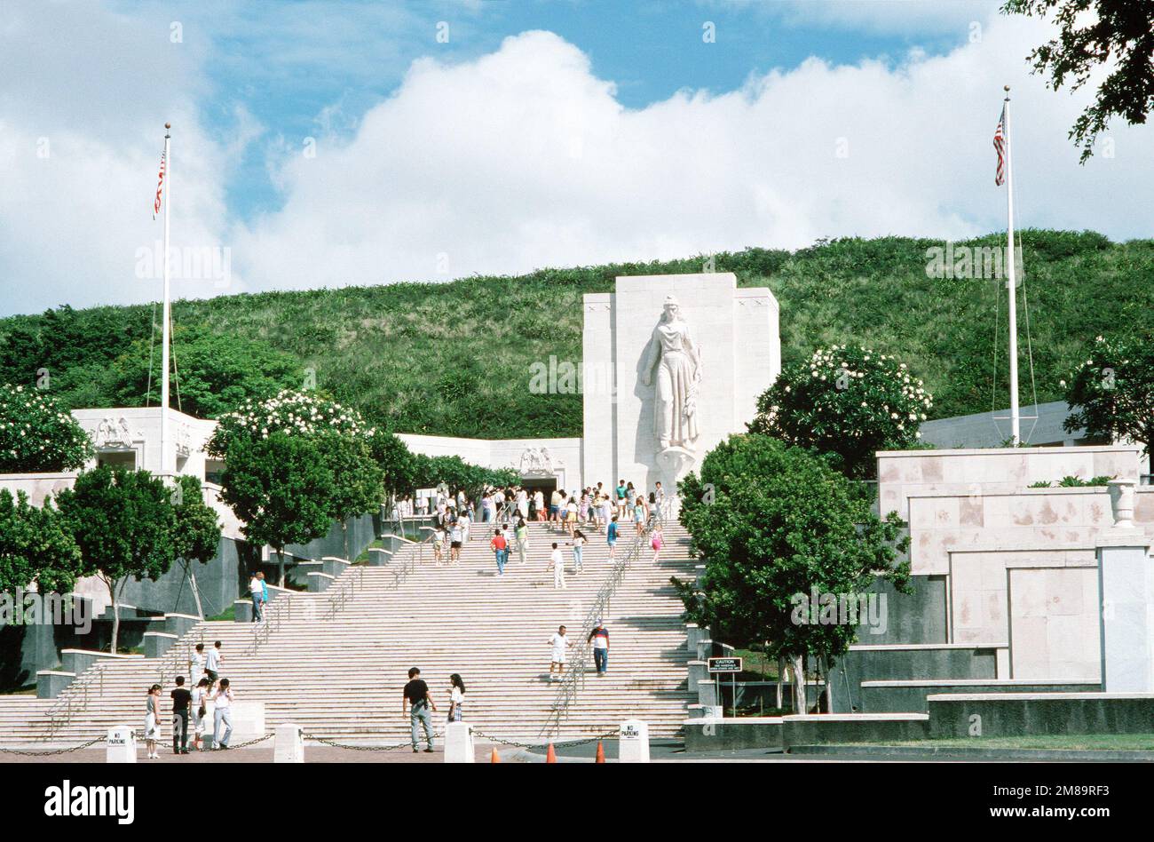 Visitors tour the National Memorial Cemetery of the Pacific, also known ...