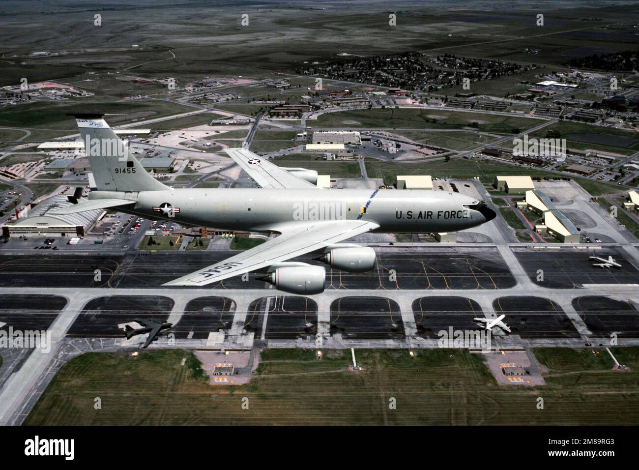 Air to air left side view of a 28th Aerial Refueling Squadron KC-135R ...