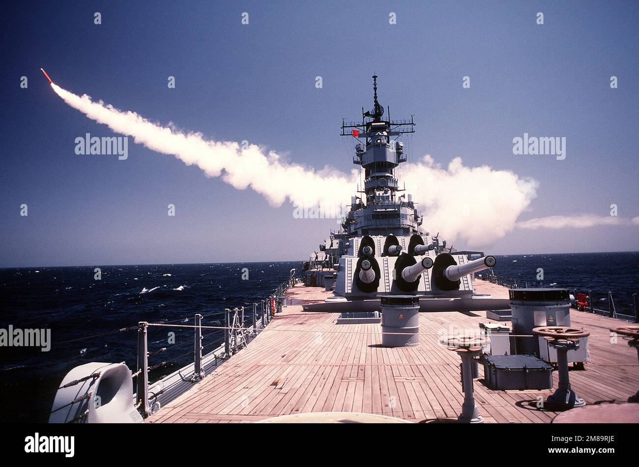 A BGM-109 Tomahawk long-range cruise missile is launched from the battleship USS MISSOURI (BB-63 ...