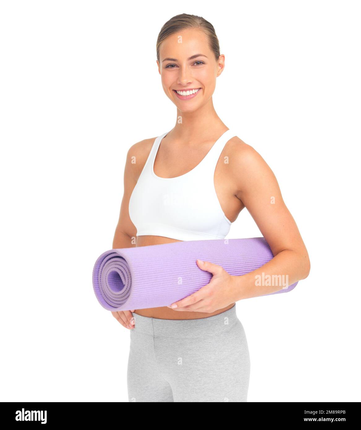 Woman, studio portrait and holding yoga mat with smile, happiness and ...