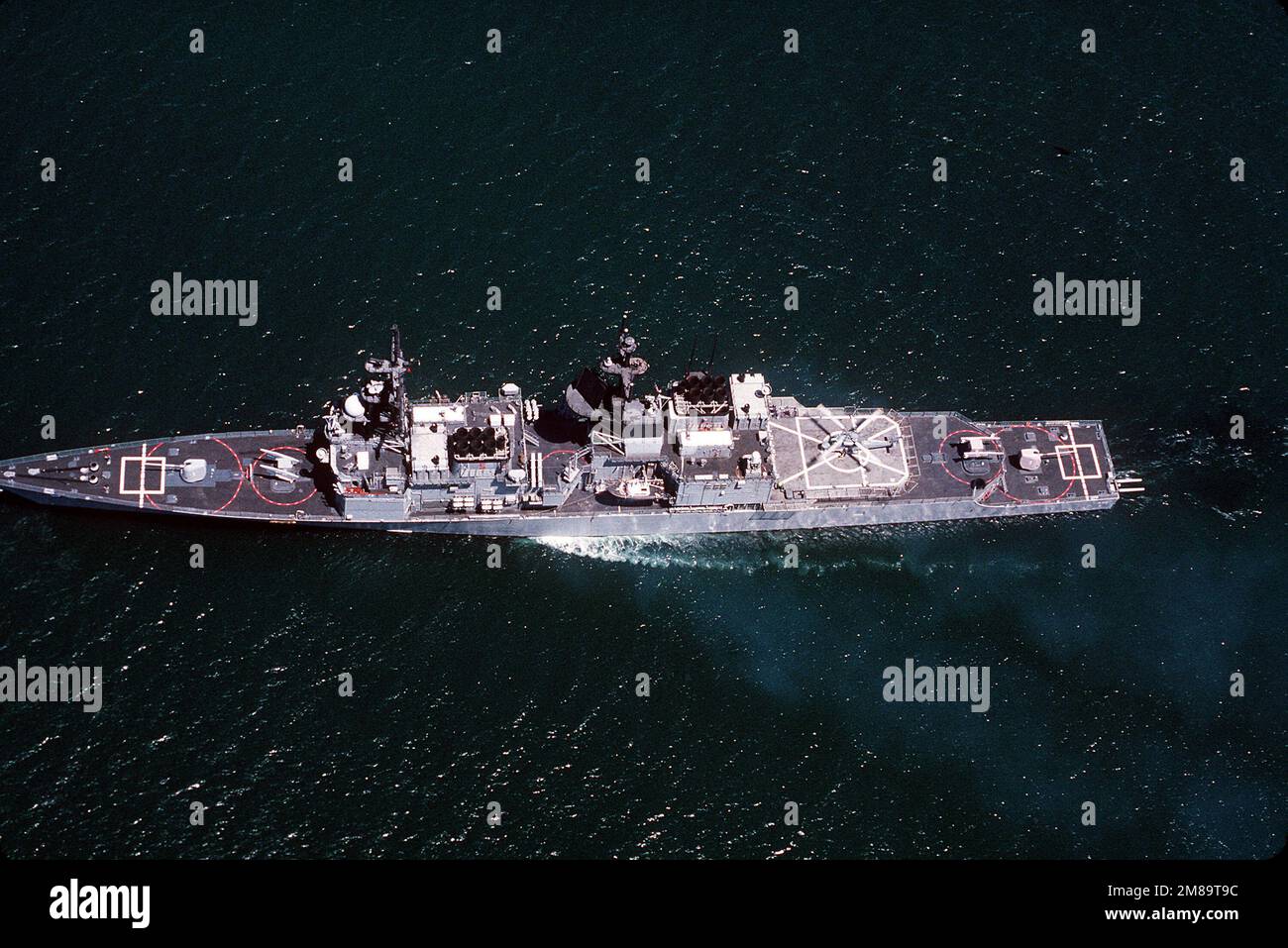 An aerial port beam view of the guided missile destroyer USS CHANDLER ...