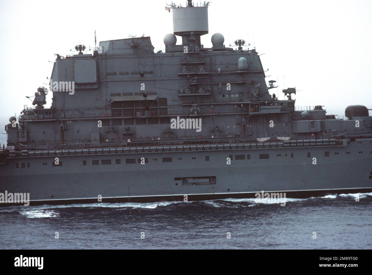 A starboard amidships view of the superstructure, radar equipment, and ...