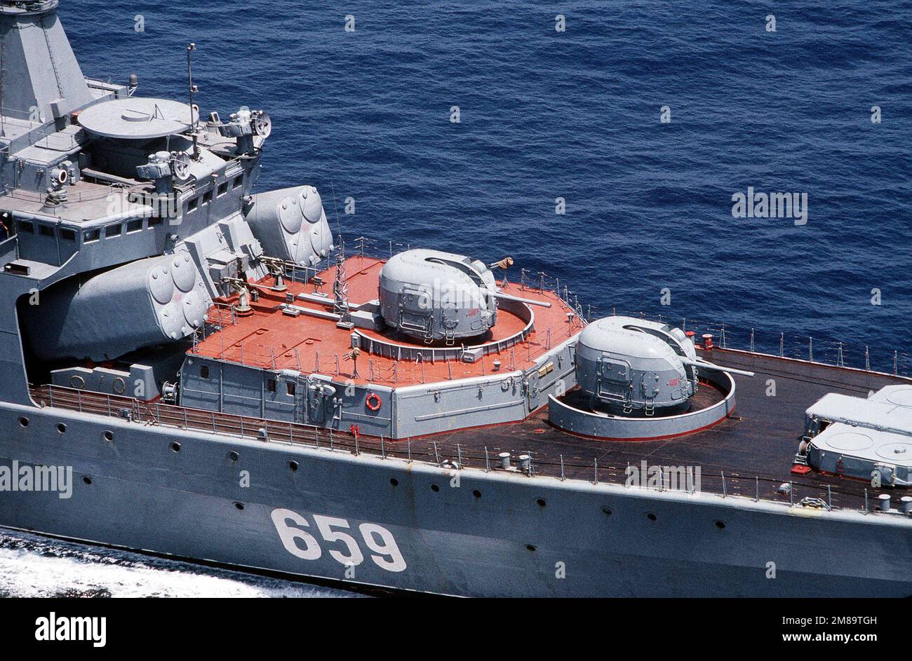 A view of SS-N 14 missile launchers and 100mm dual purpose guns aboard ...