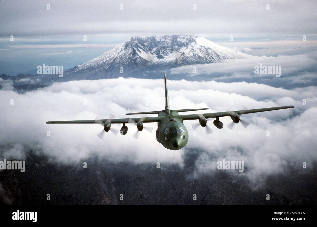 An air-to-air front view of a C-130E Hercules aircraft of the 36th ...