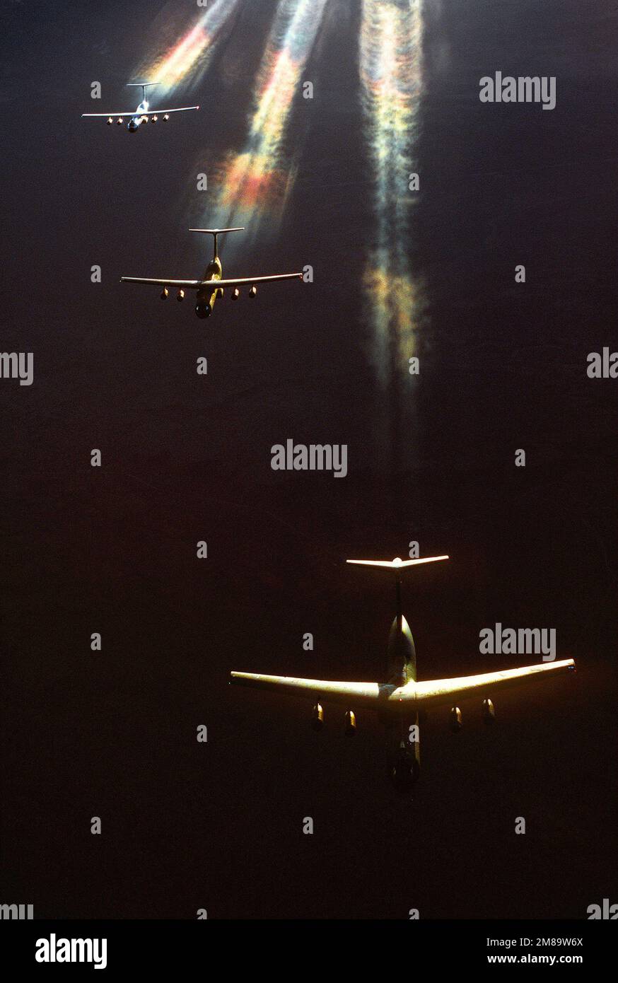 An air-to-air front view of C-141B Starlifter aircraft from the 53rd ...