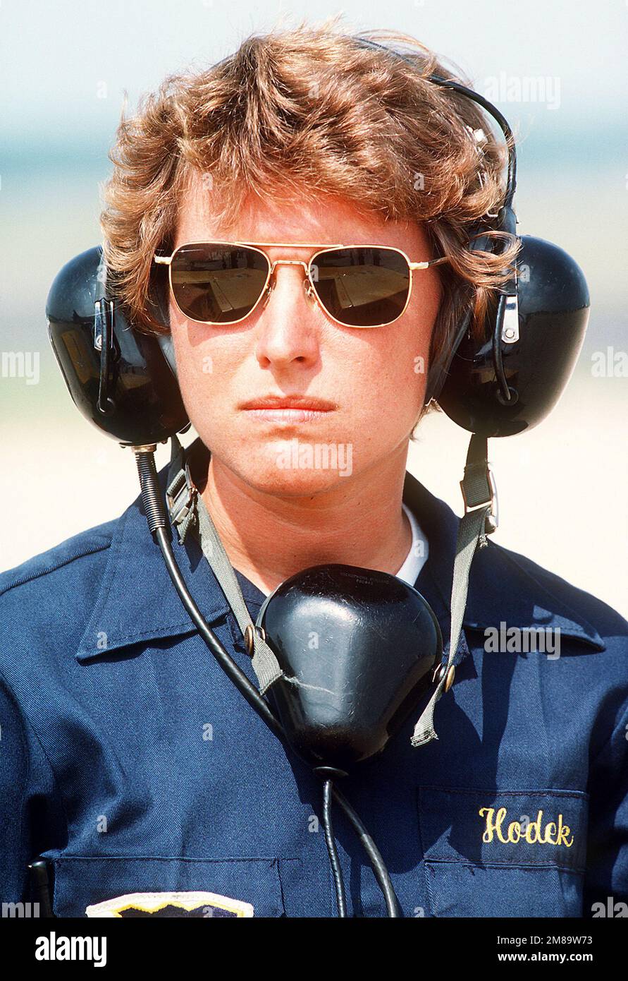A female ground crew member provides ground support for the Blue Angels, the Navy's flight ...