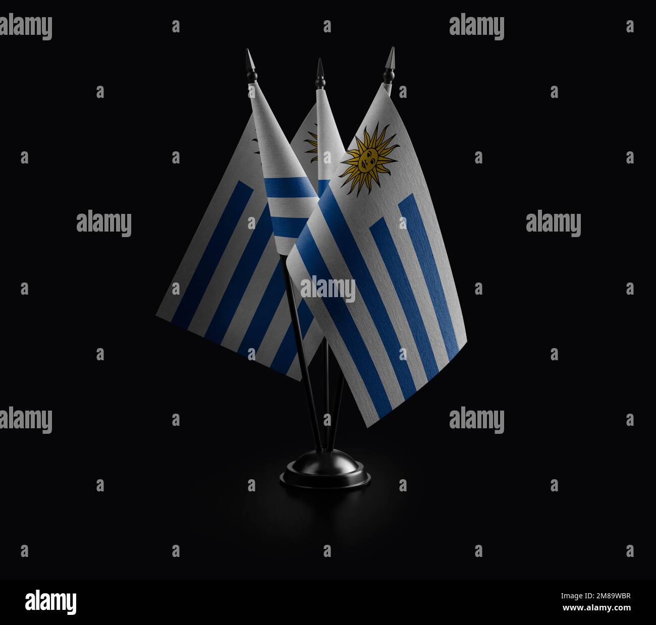 Small national flags of the Uruguay on a black background Stock Photo ...