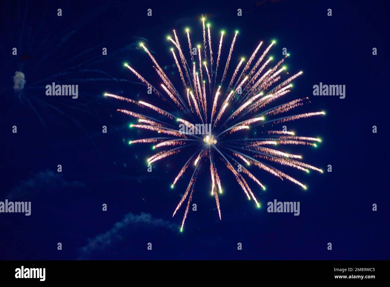 Bright light flash of fireworks, against the background of the night ...