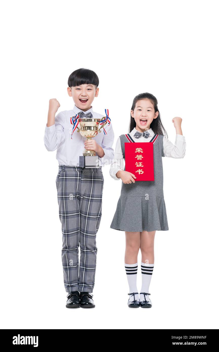 Happy pupils with a trophy and certificate Stock Photo - Alamy