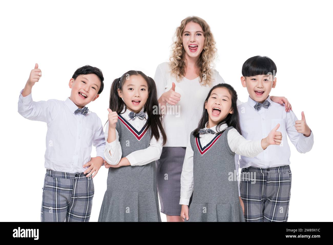 Female teachers guide students learning Stock Photo - Alamy