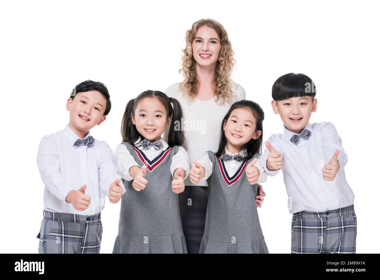 Female teachers guide students learning Stock Photo - Alamy