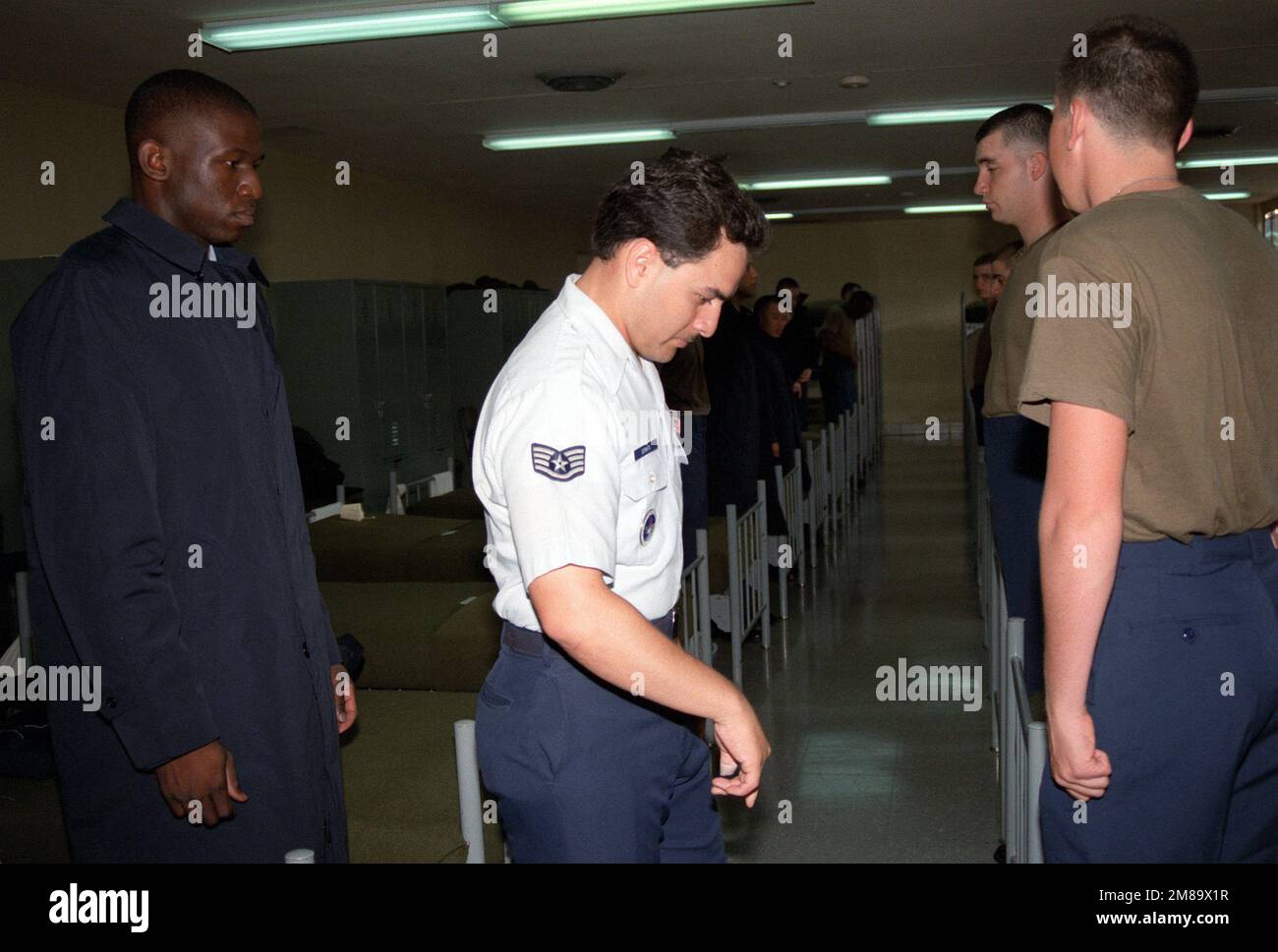 An instructor from the 3701st Basic Military Training Squadron performs ...