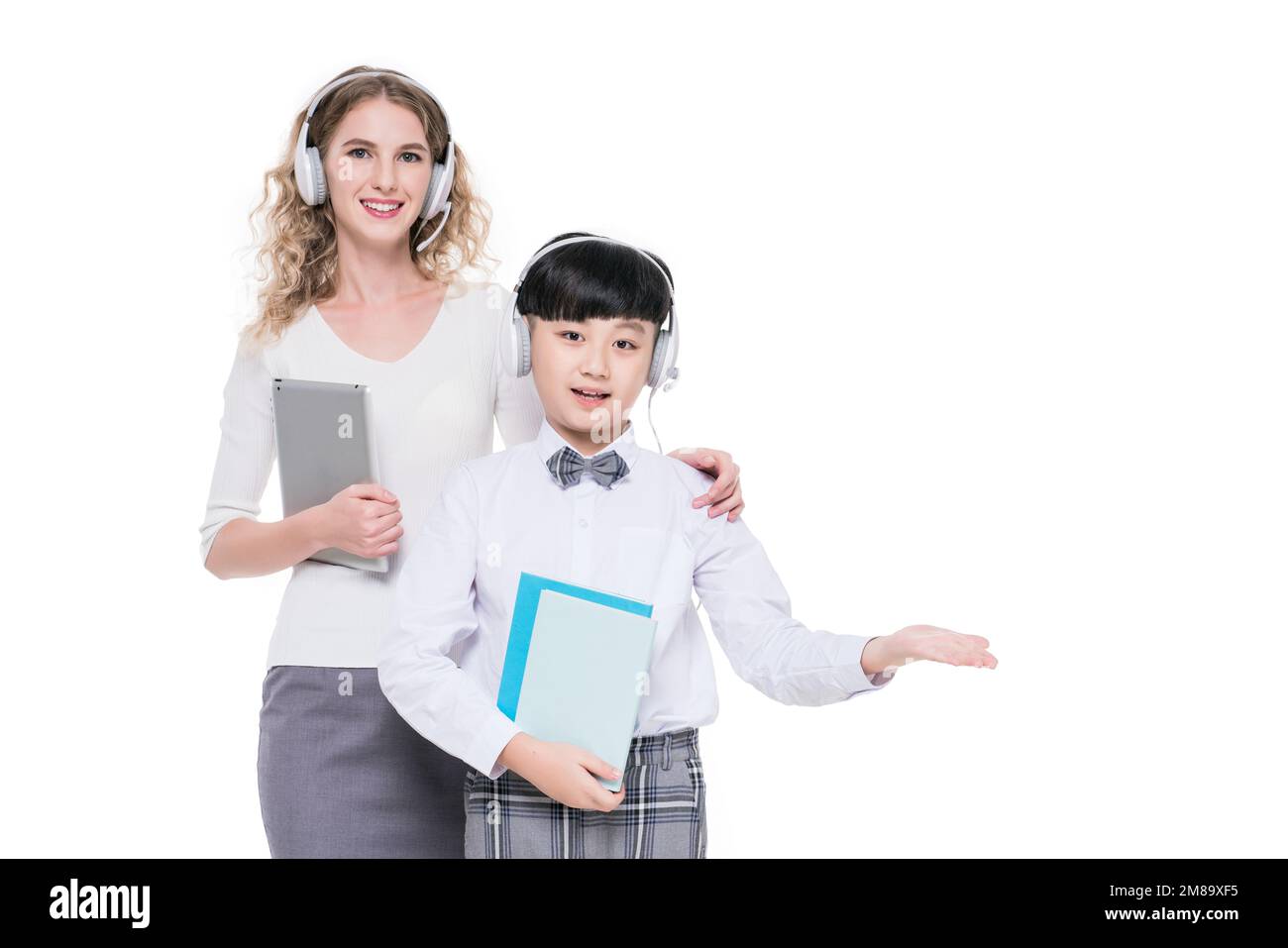 Female teachers guide students learning Stock Photo - Alamy