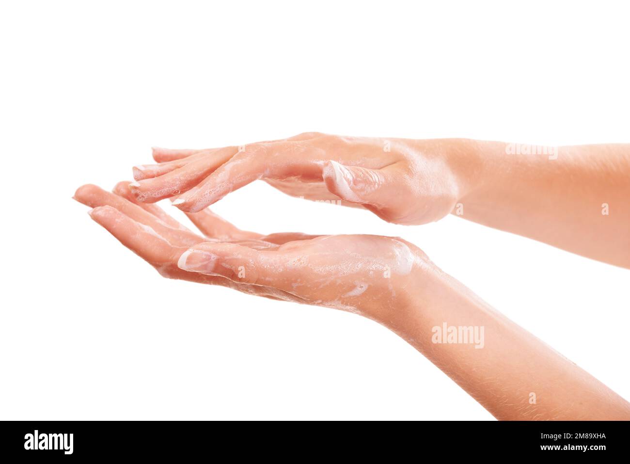 Getting her hands clean. a woman lathering her hands Stock Photo - Alamy
