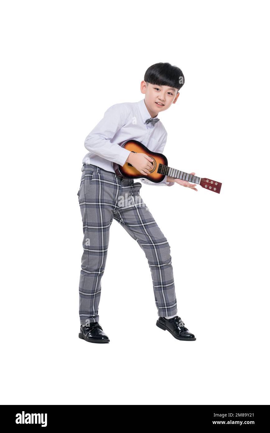 Happy pupils playing the guitar Stock Photo - Alamy