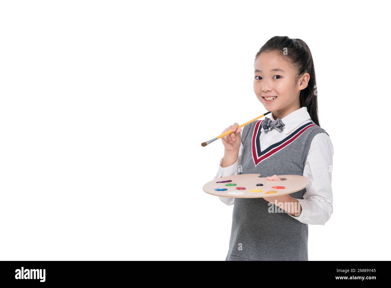 Happy pupils take palette Stock Photo - Alamy