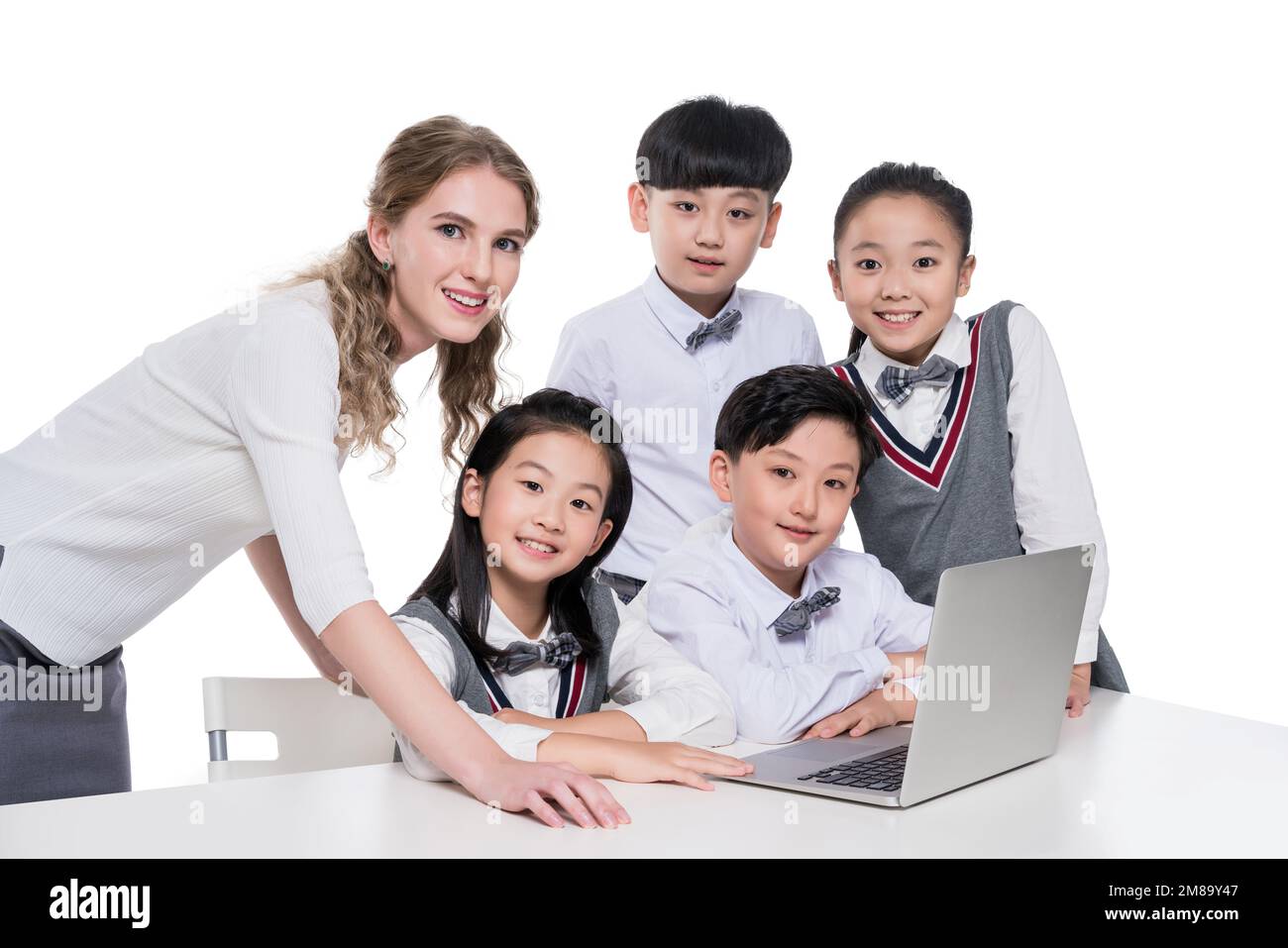 The teacher guiding students learning Stock Photo - Alamy