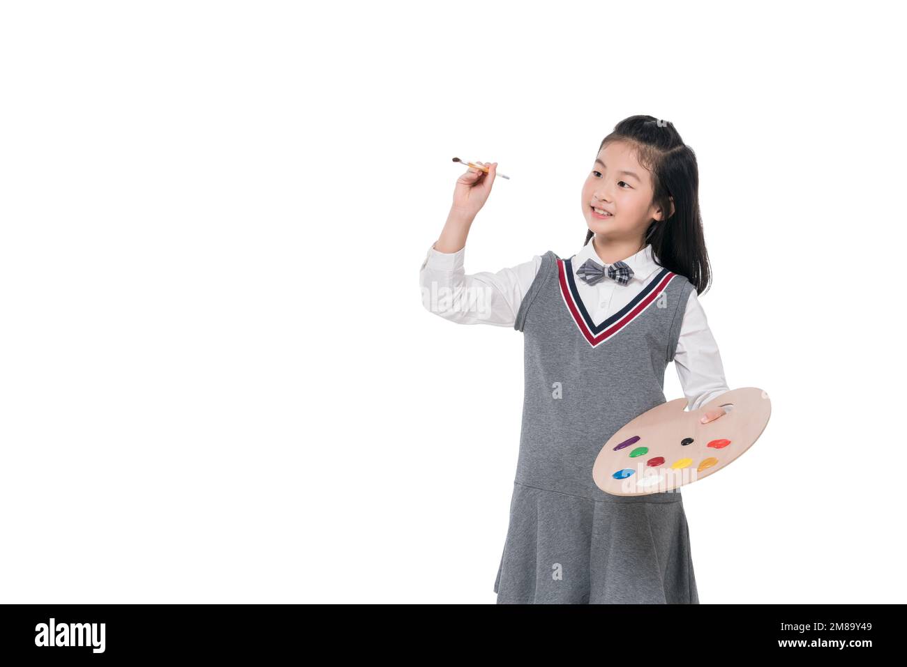 Happy pupils take palette Stock Photo - Alamy