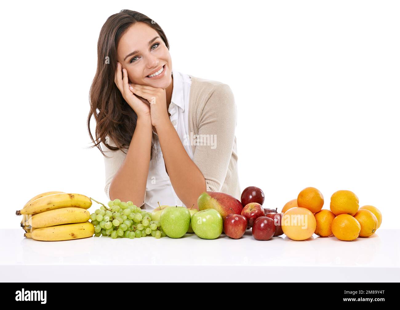 Woman, happy portrait and fruits in studio for nutrition, healthy diet ...