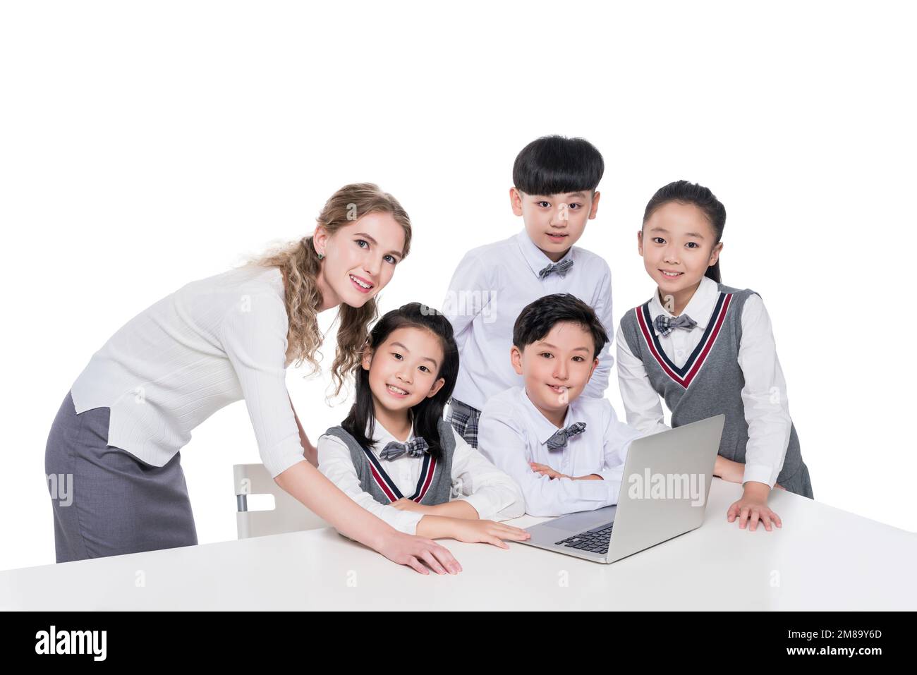 The teacher guiding students learning Stock Photo - Alamy