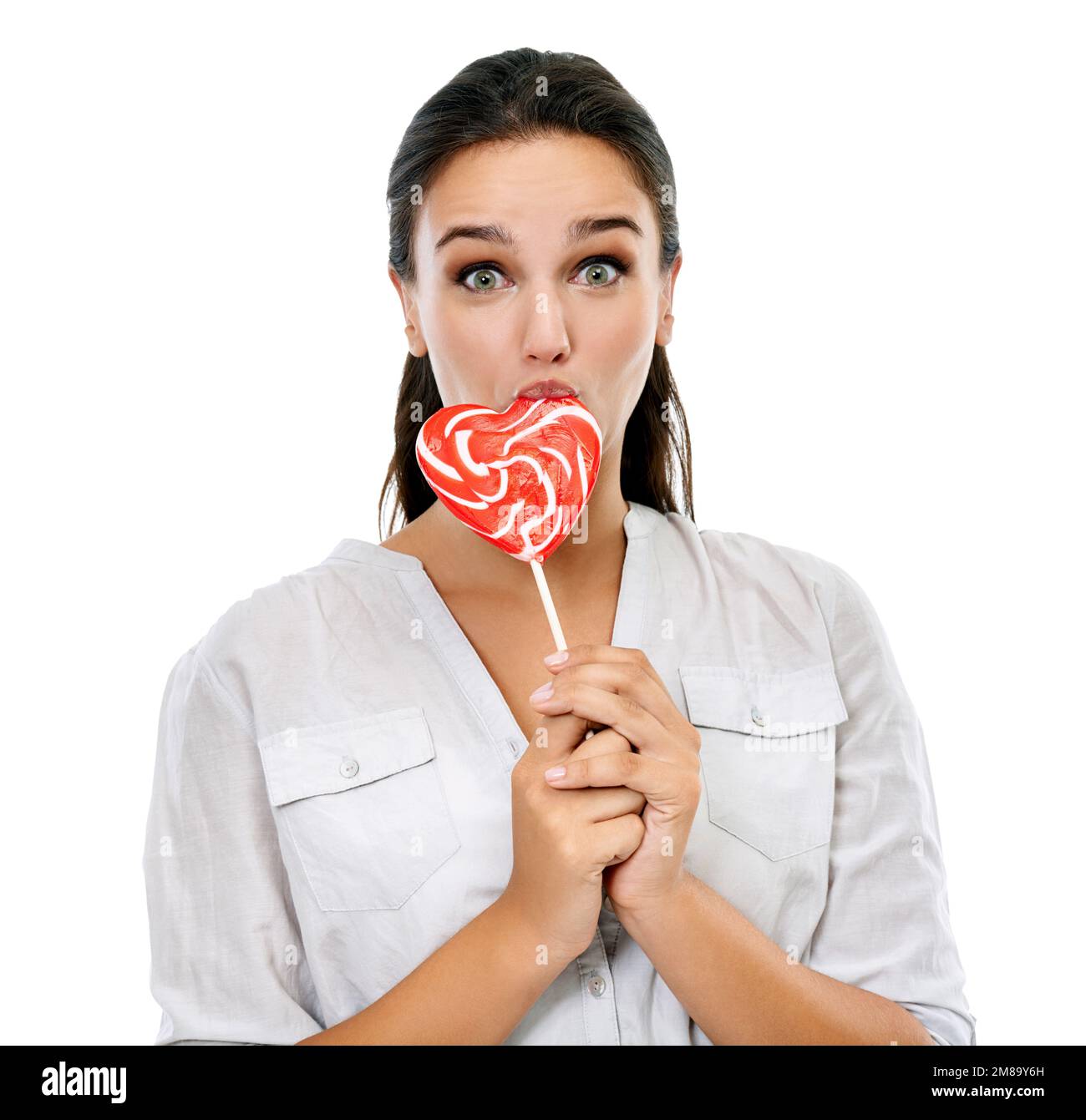 Candy, portrait and happy woman with a lollipop in a studio for a ...