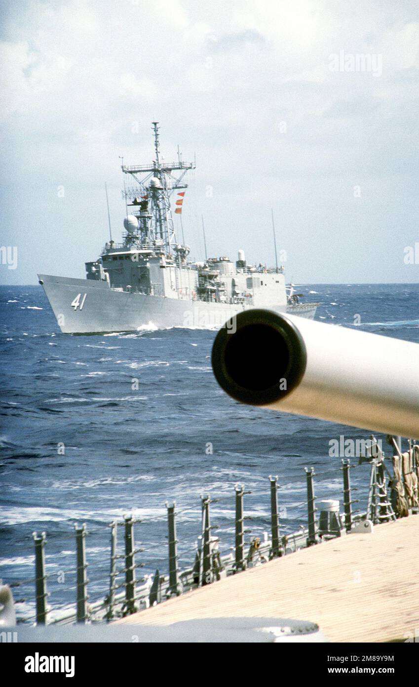 The guided missile frigate USS MCCLUSKEY (FFG-41) approaches the ...