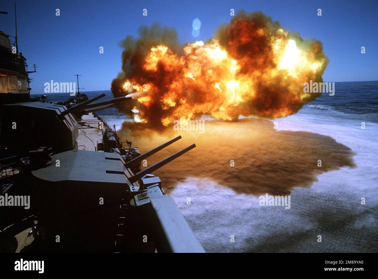 The Battleship USS MISSOURI (BB-63) fires one of its Mark 7 16-inch 50 ...