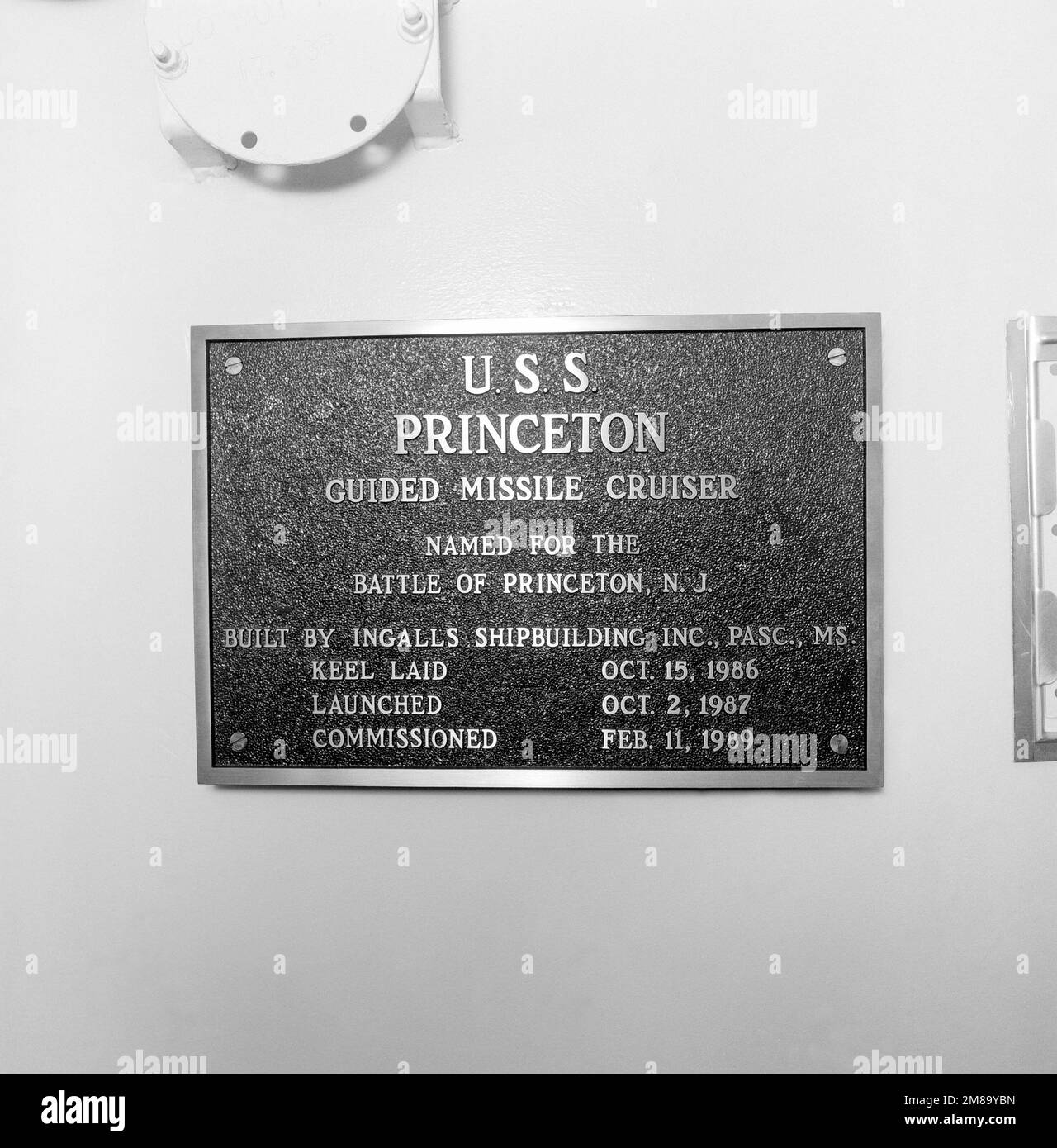 The historical data plaques for the guided missile cruiser USS ...