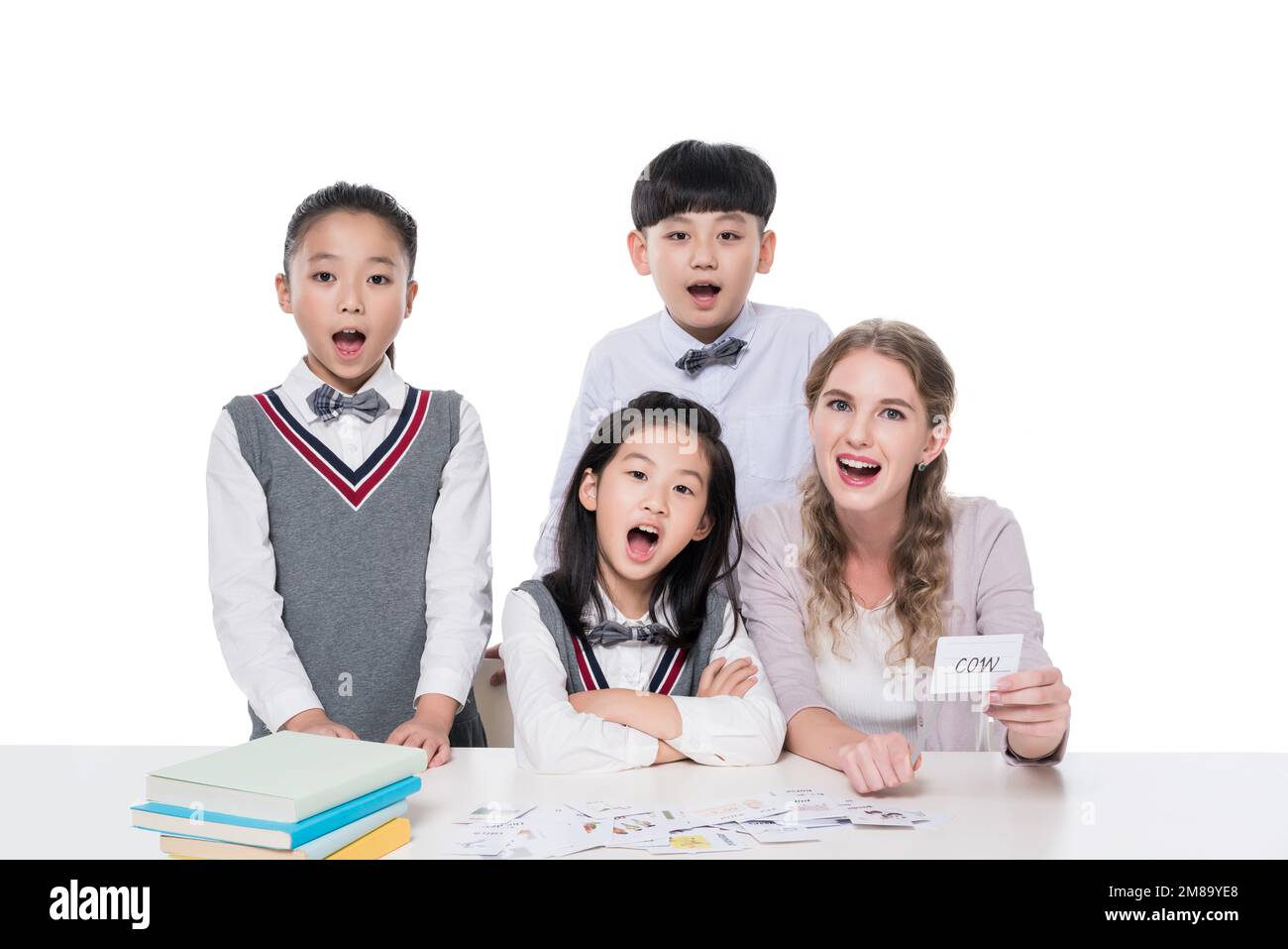 Female teachers guide students learning Stock Photo - Alamy
