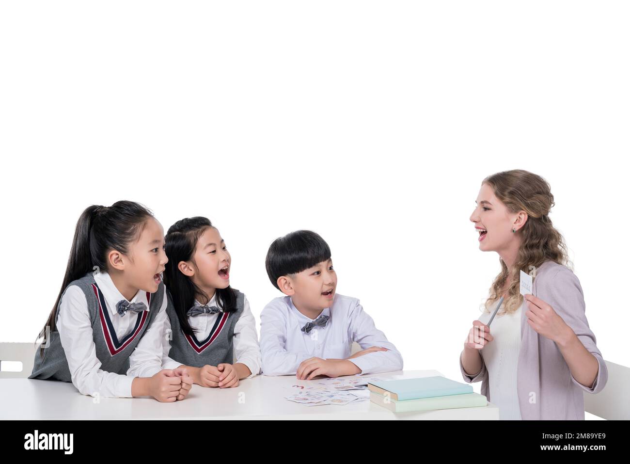 Female teachers guide students learning Stock Photo - Alamy
