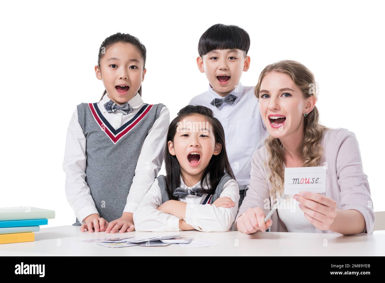 Female teachers guide students learning Stock Photo - Alamy