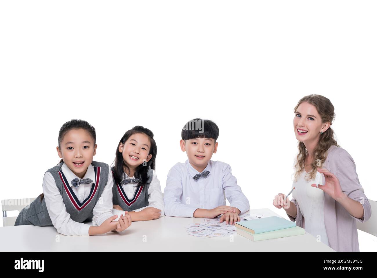 Female teachers guide students learning Stock Photo - Alamy